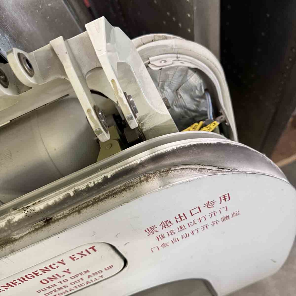 Xiamen Airlines Boeing 737 B-5216/N340FT emergency exit - Aviation Gadgets